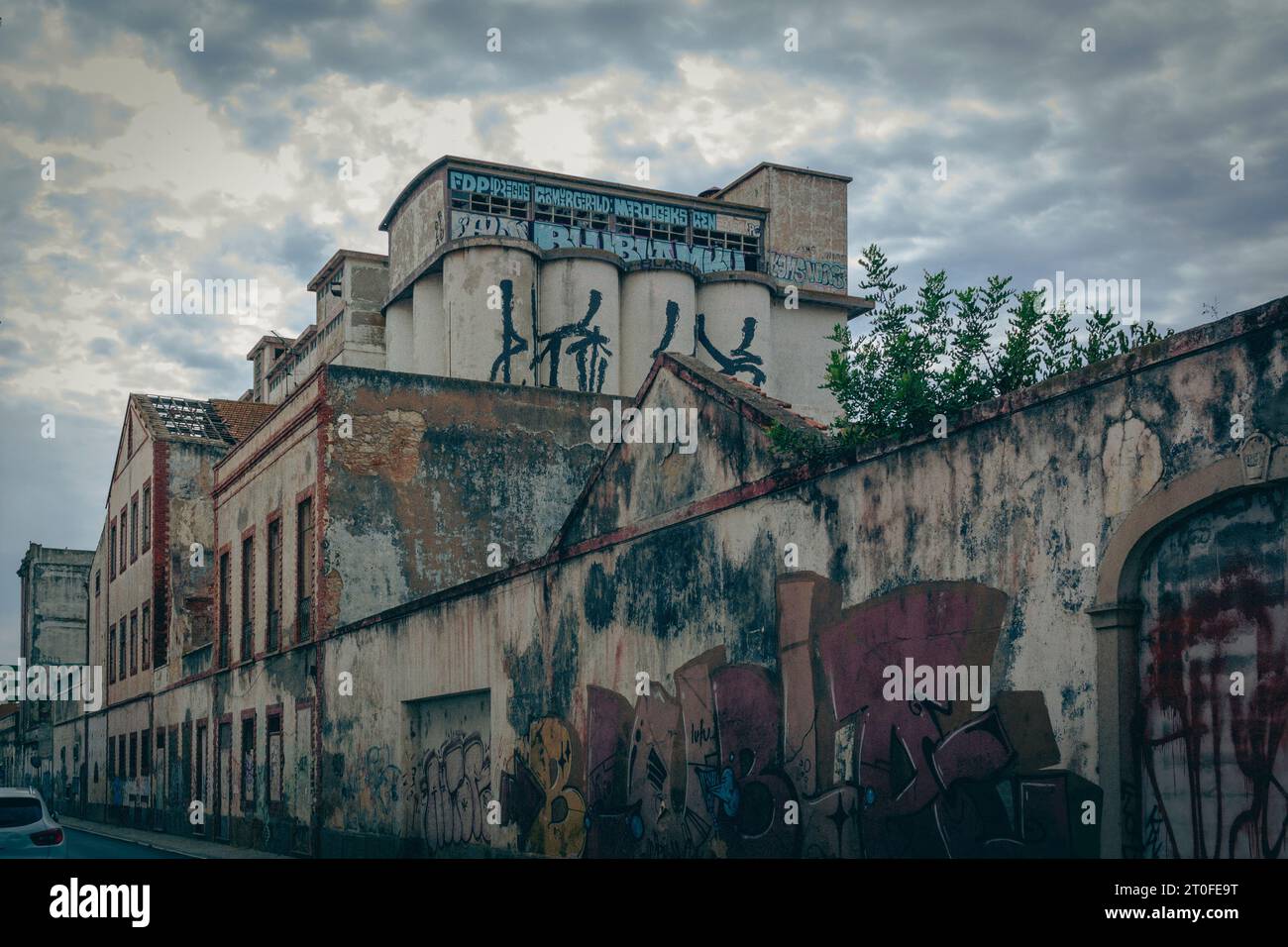 Old rundown flour mill factory in Faro, Algarve, Portugal Stock Photo ...
