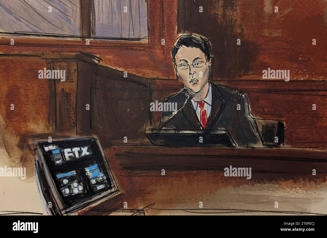 This courtroom sketch shows FTX co-founder Gary Wang on the witness ...