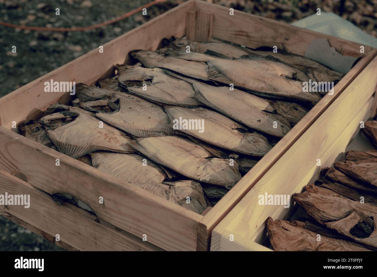 Smoked fish in a craft paper box. Ready for product delivery. Baltic ...