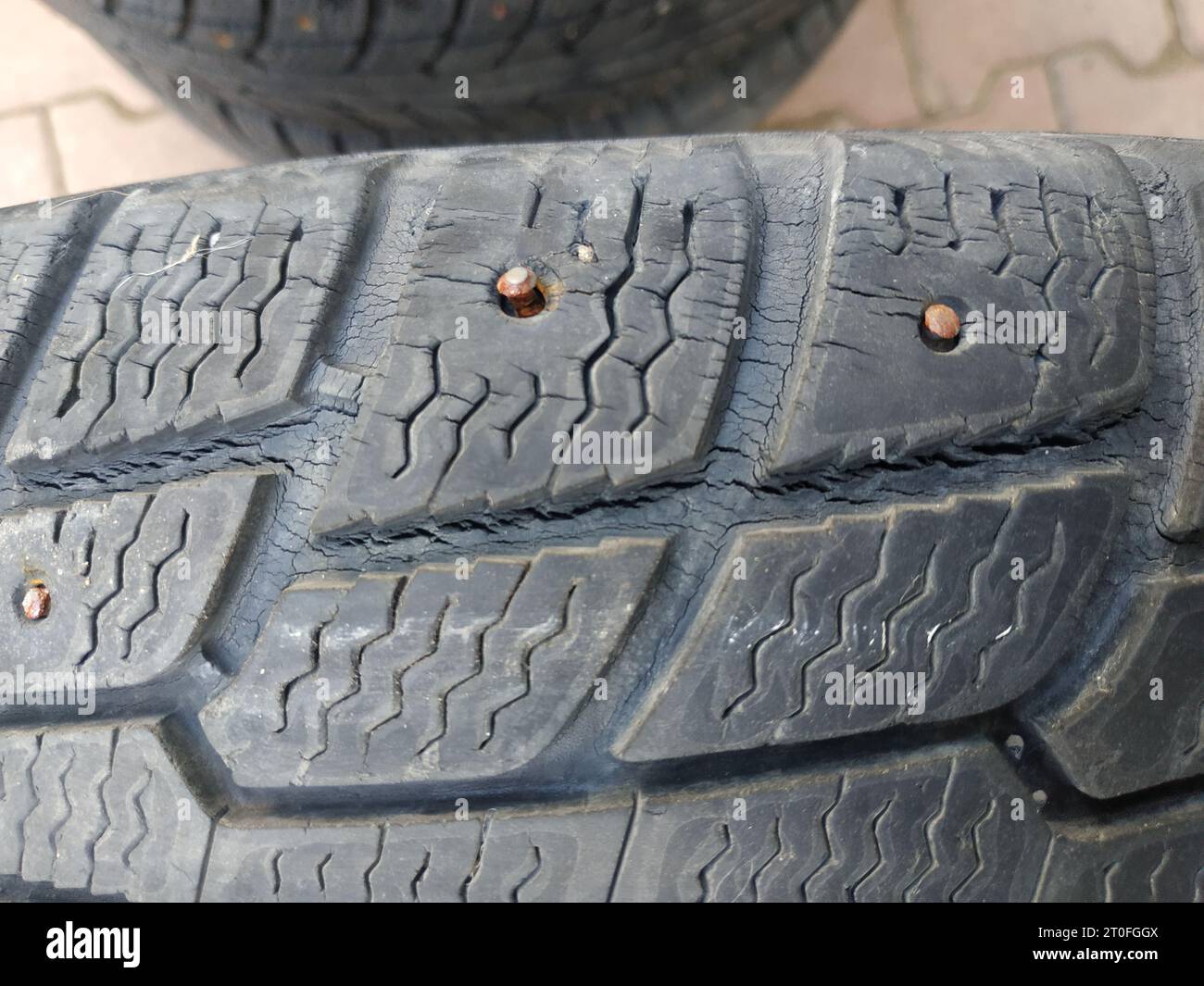 Old worn car tires. Damaged rubber. Old tyres. Recycling of rubber ...