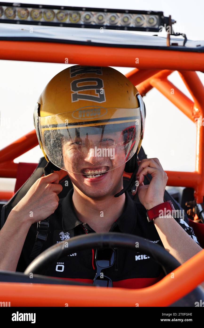Doha, Qatar. 04th Oct, 2023. Zhou Guanyu (CHN) Alfa Romeo F1 Team - Desert Dune Buggy experience ...