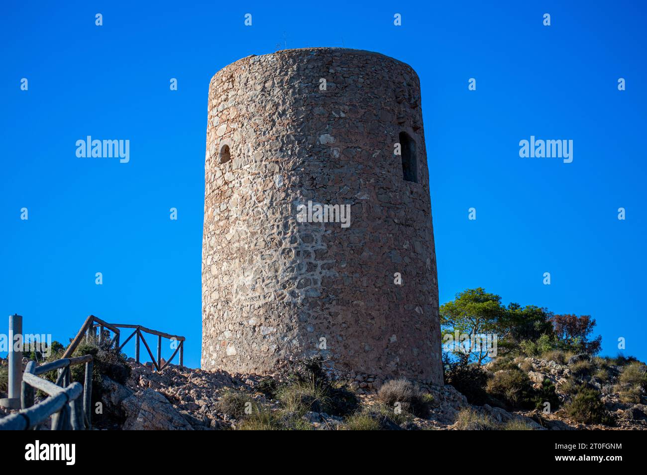 Mediterranean coastal landscape. Historic Torre Vigia De Cerro Gordo, a ...