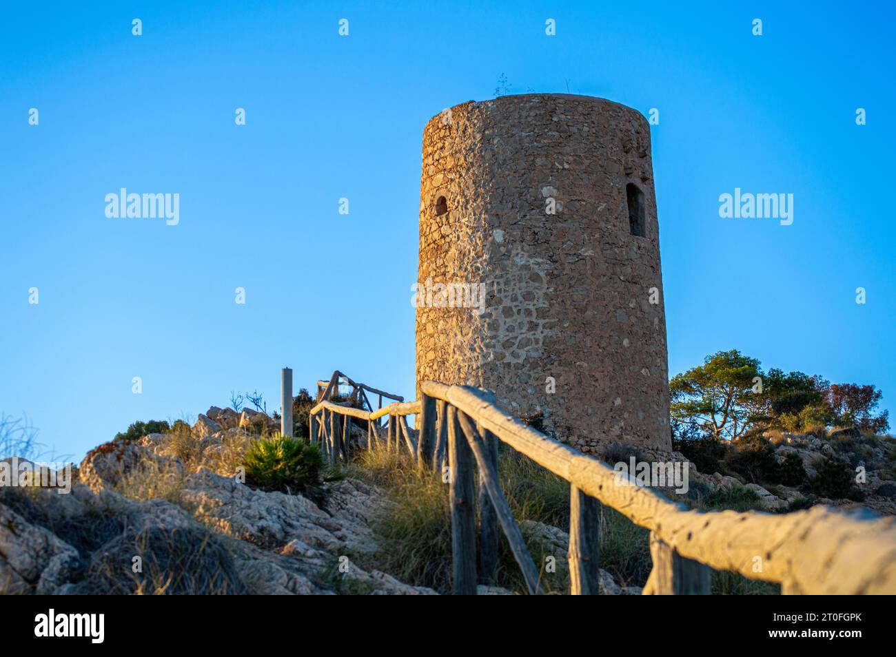 Mediterranean coastal landscape. Historic Torre Vigia De Cerro Gordo, a ...