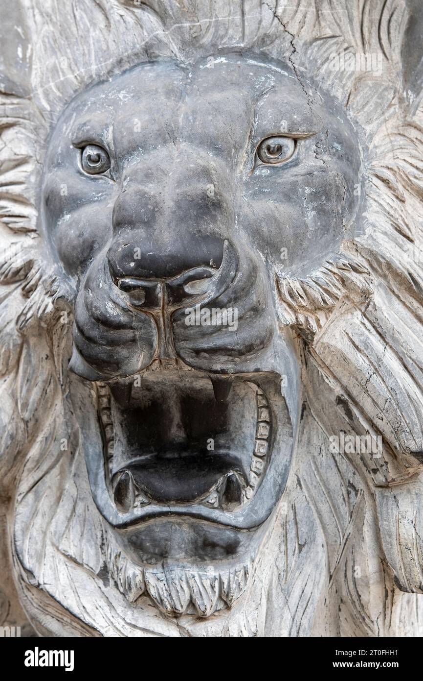 fierce looking stone lion sculpture. lion head modelled in concrete for ...