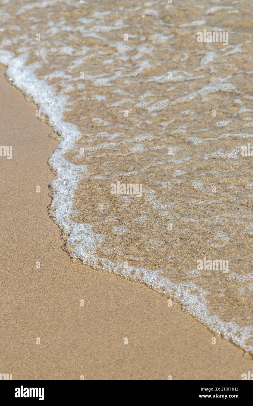Foaming sea at beach edge hi-res stock photography and images - Alamy