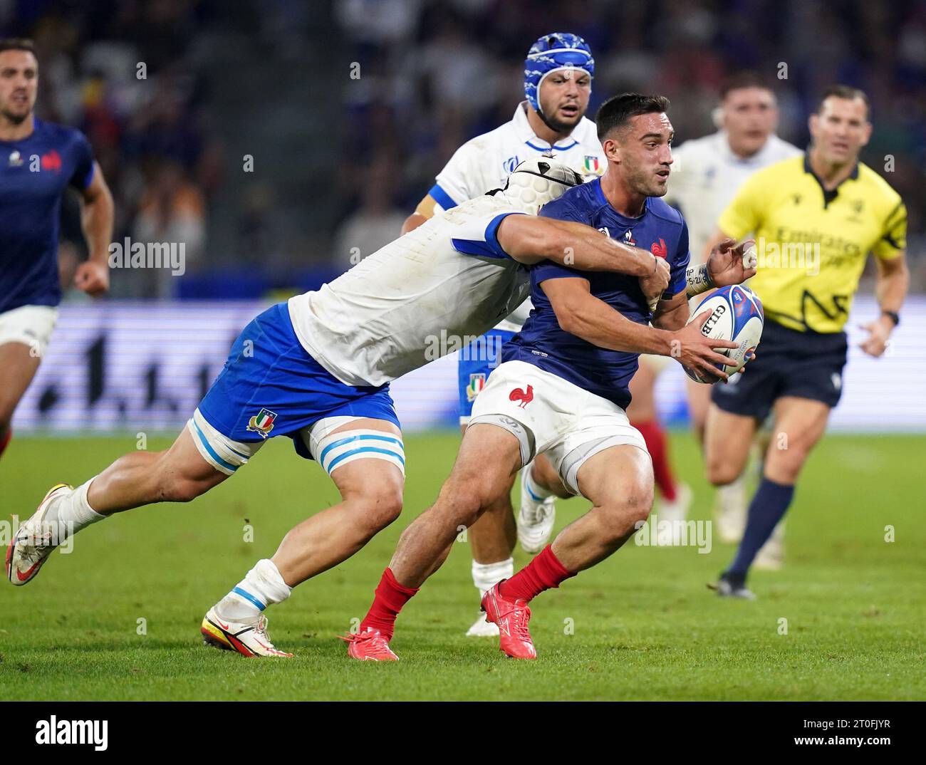 Italy's Manuel Zuliani tackles France's Baptiste Couilloud during the ...