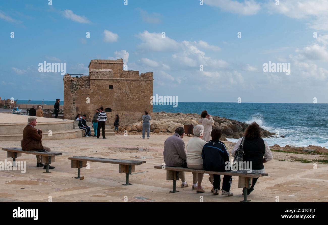 Tourist people enjoying the scenery at paphos castle area in cyprus ...