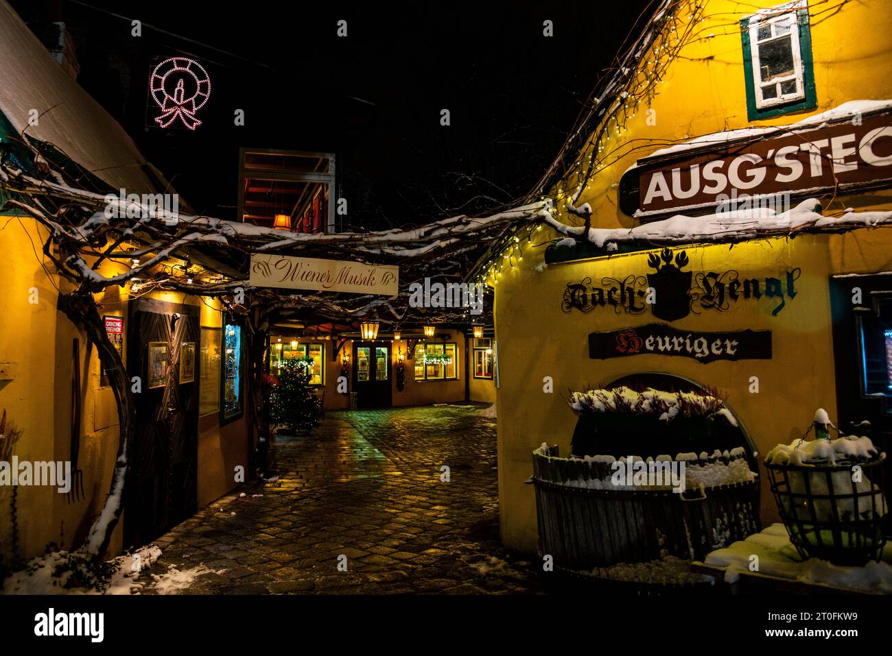 Traditional wine taverns or Heuriger and the wine village of Grinzing ...