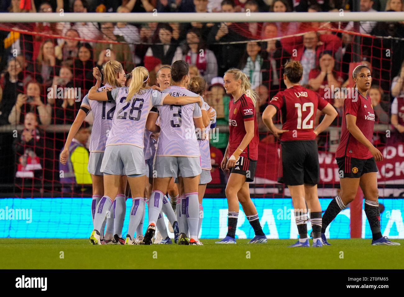 Arsenal Women players celebrate their added time equaliser scored by ...