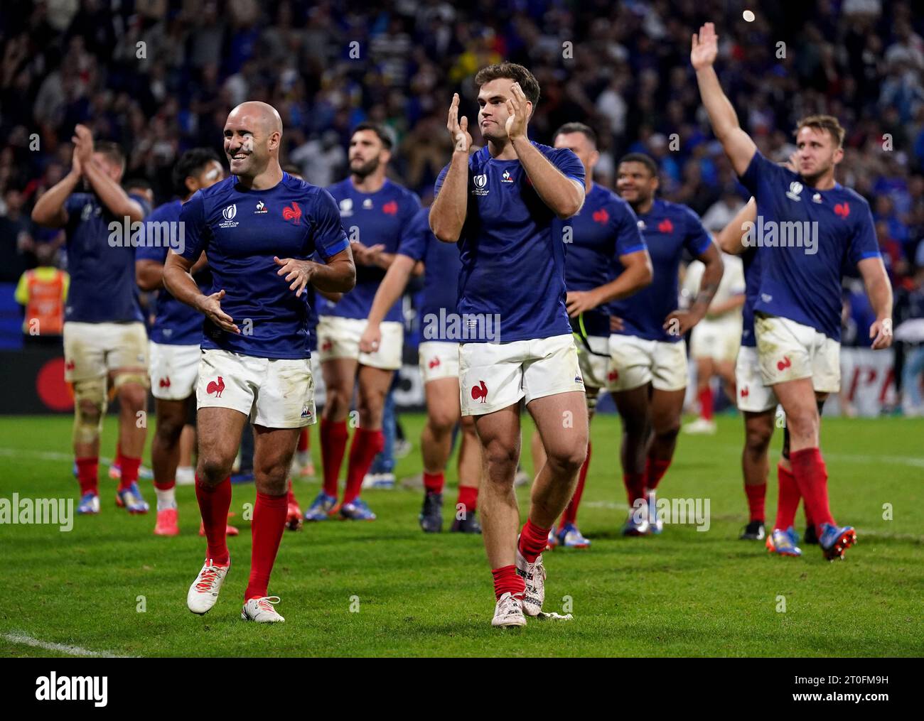 France's Maxime Lucu (left) and Damian Penaud applaud the fans after ...