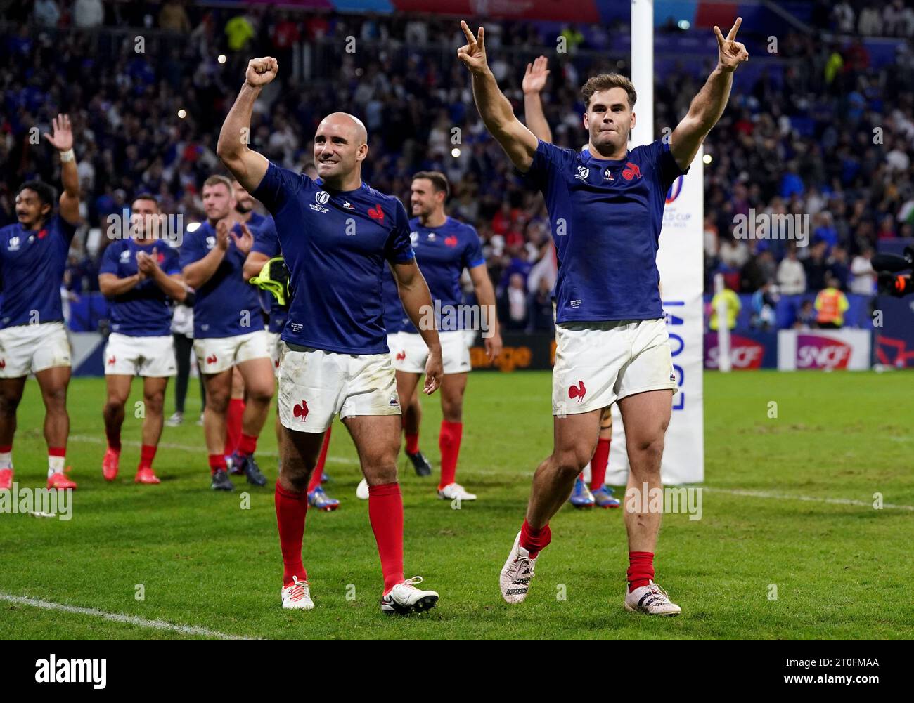 France's Maxime Lucu (left) and Damian Penaud applaud the fans after ...