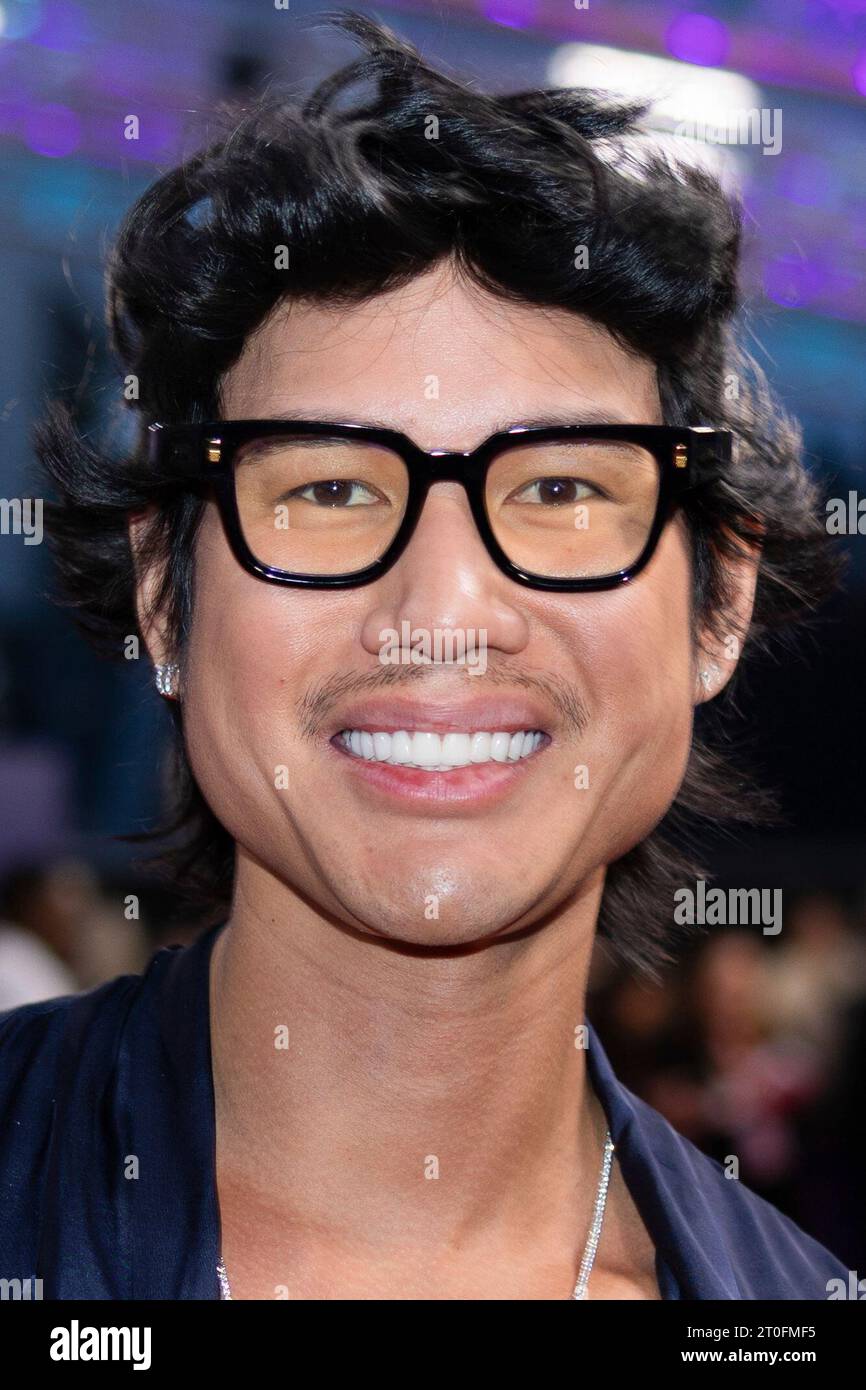 Patrick Ta poses for photographers upon arrival for the premiere of the ...