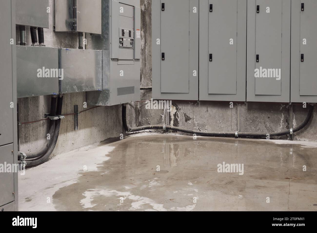 Electrical room with water flooding ground. Below-grade service room or ...