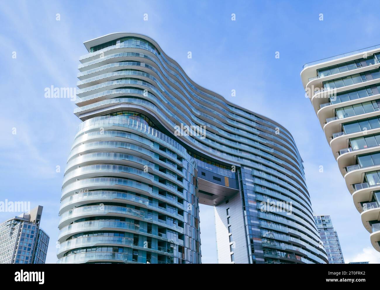 Modern highrise building or tall residential towers with blue sky ...