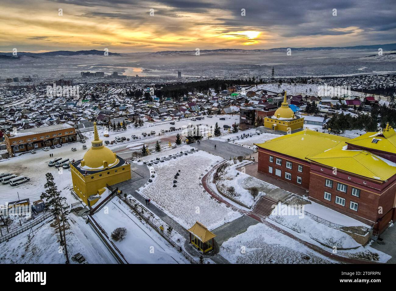 The aerial photo of Buddhist Temple of Rinpoche Bagsha during the winter sunset over Siberian ...