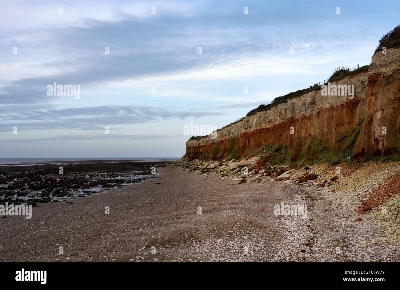 The colourful Hunstanton cliffs of white chalk, red chalk and orange ...
