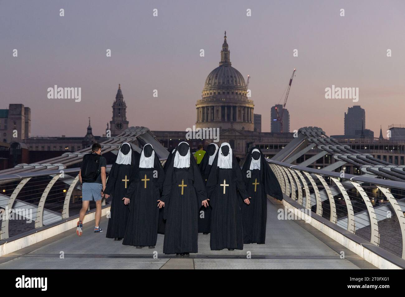 Seven demonic nuns descend on London's Millennium Bridge to celebrate ...