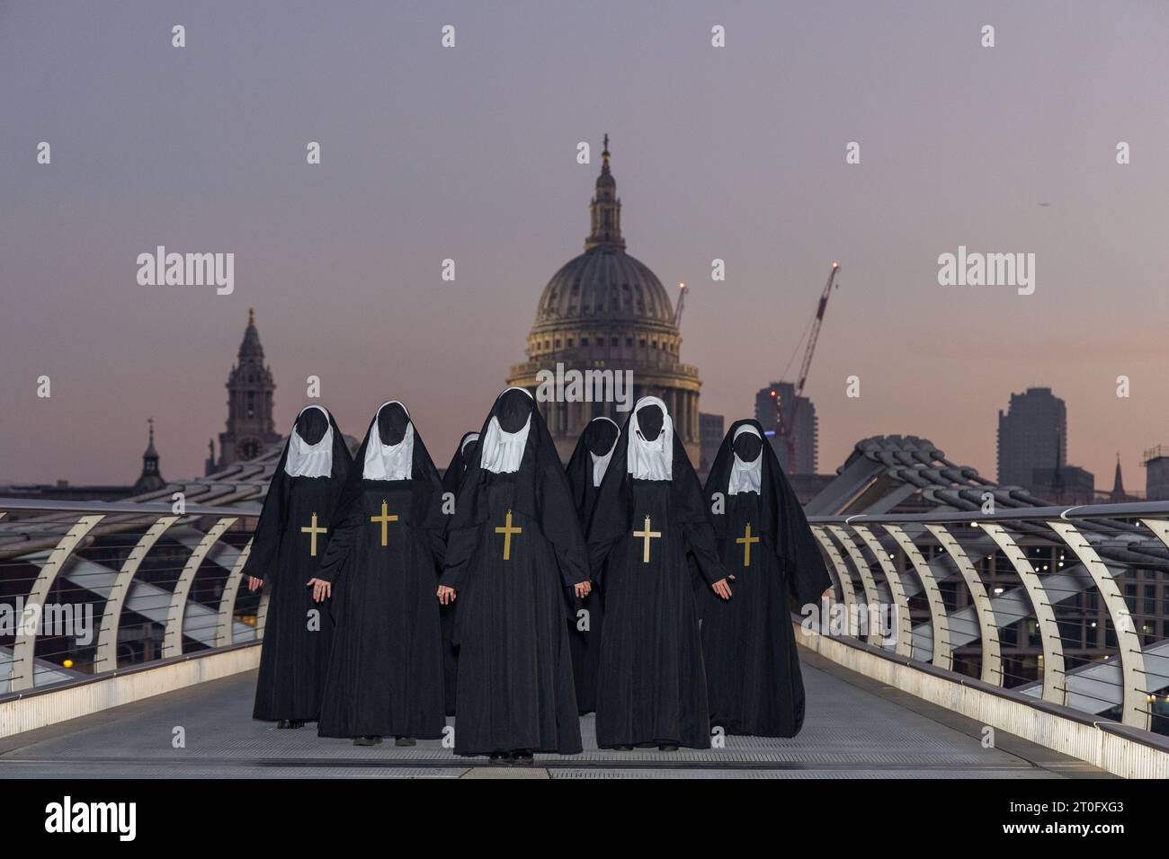 Seven demonic nuns descend on London's Millennium Bridge to celebrate ...