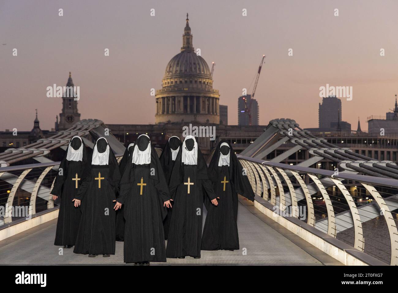 Seven demonic nuns descend on London's Millennium Bridge to celebrate ...