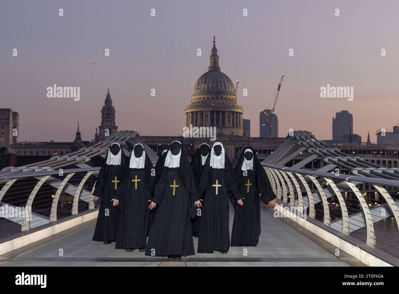 Seven demonic nuns descend on London's Millennium Bridge to celebrate ...