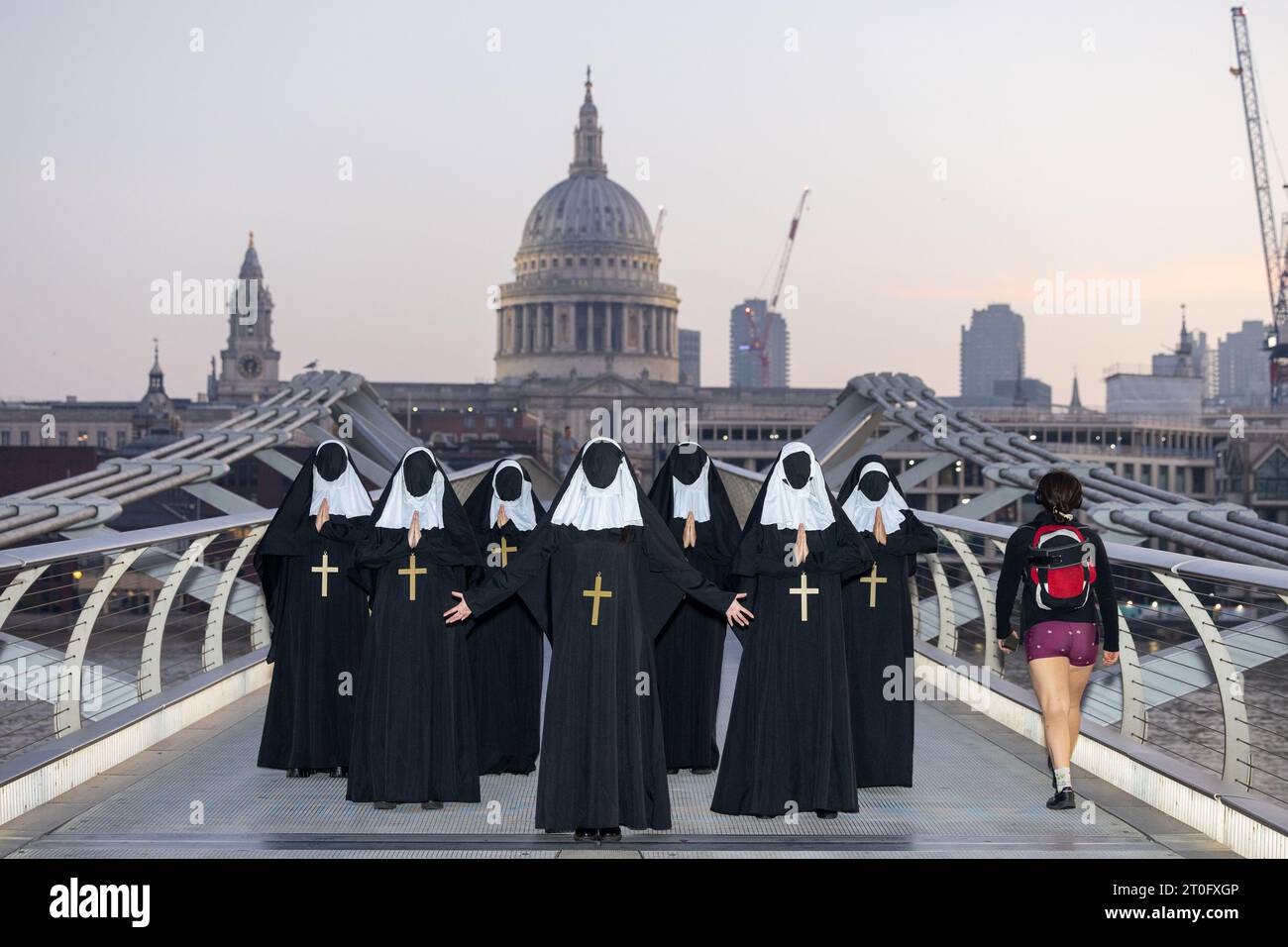 Seven demonic nuns descend on London's Millennium Bridge to celebrate ...