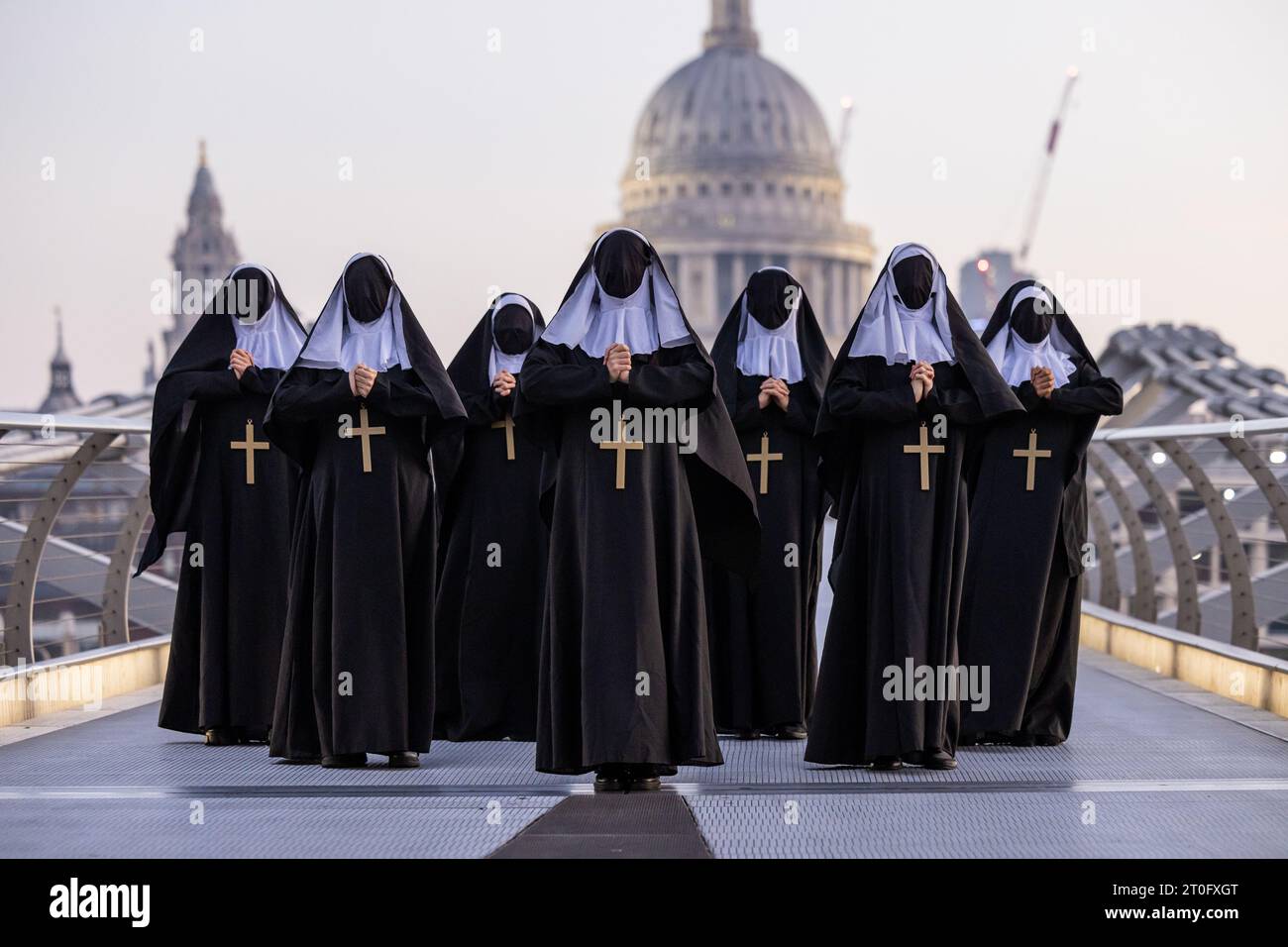 Seven demonic nuns descend on London's Millennium Bridge to celebrate ...