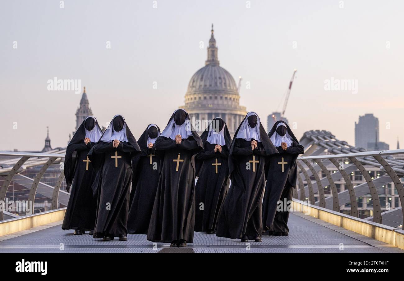 Seven demonic nuns descend on London's Millennium Bridge to celebrate ...