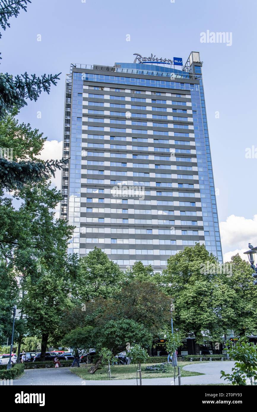 Riga, Latvia- July 7, 2023: Hotel Radisson Blu Tall Skyscraper glass ...