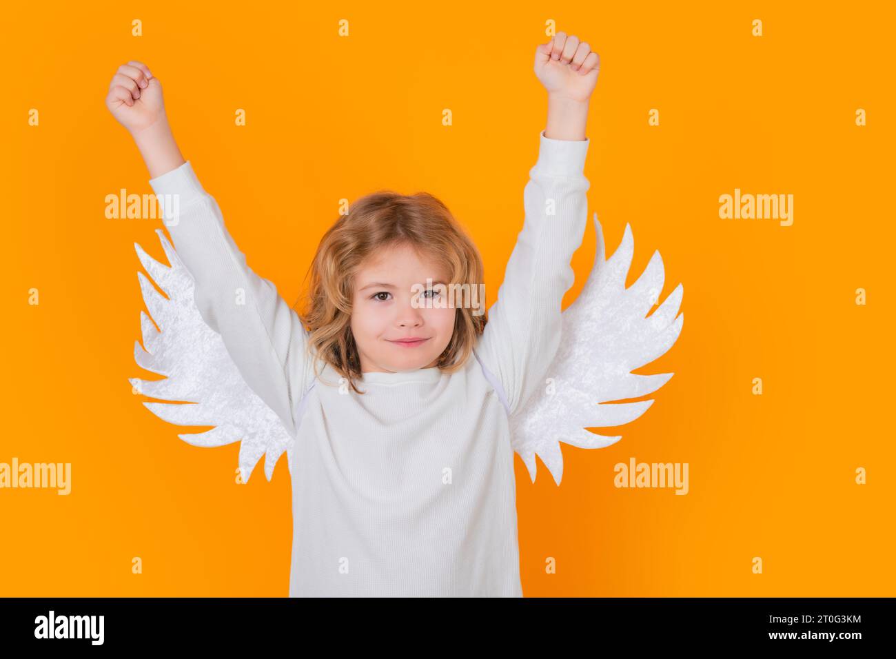 Excited little angel, amazed kids. Child angel. Portrait of cute kid ...