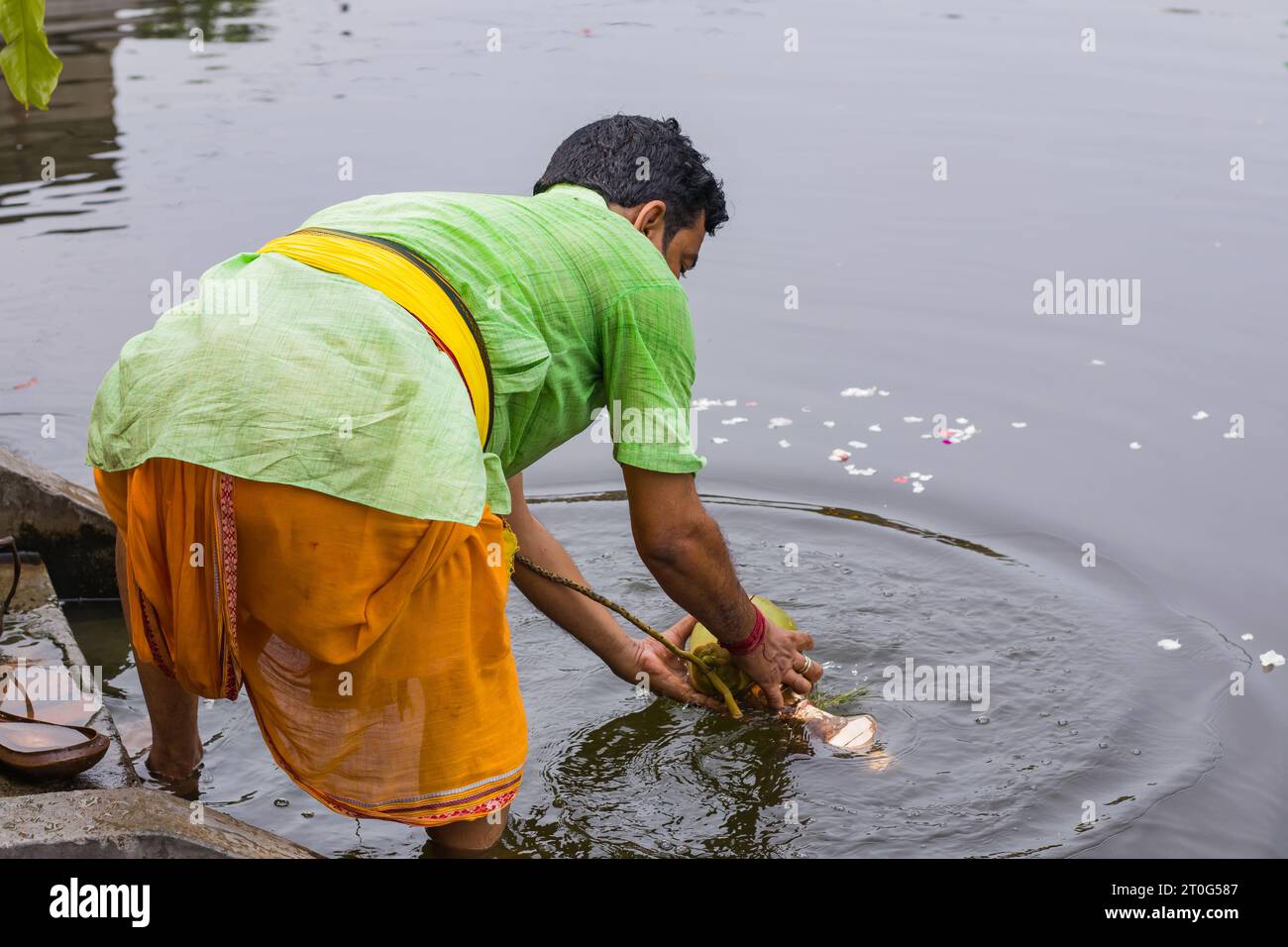Durga puja ritual being performed by priest. The Hindu priest ...