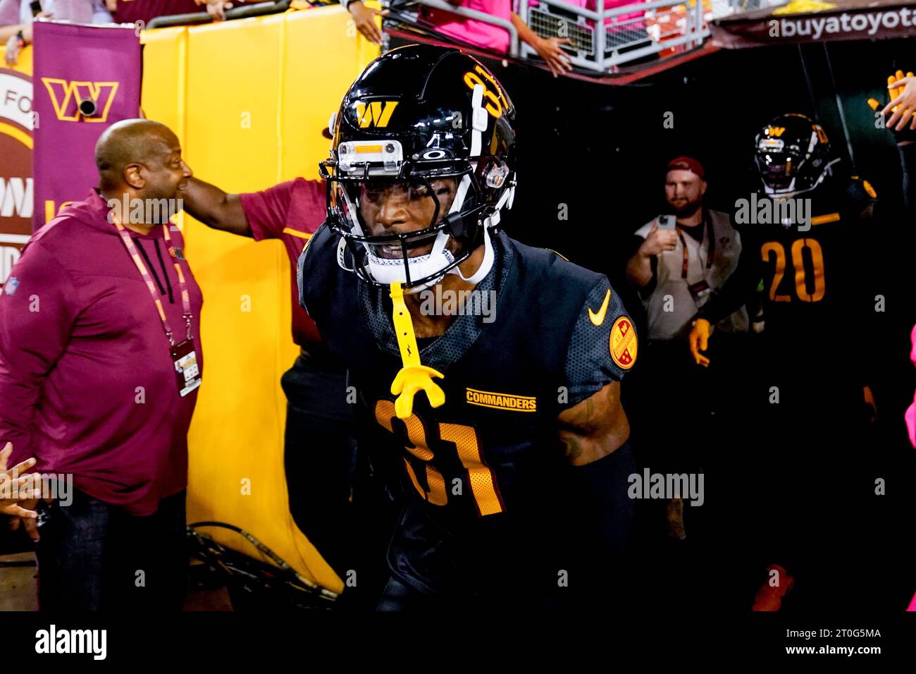 Washington Commanders safety Kamren Curl takes the field before an NFL ...
