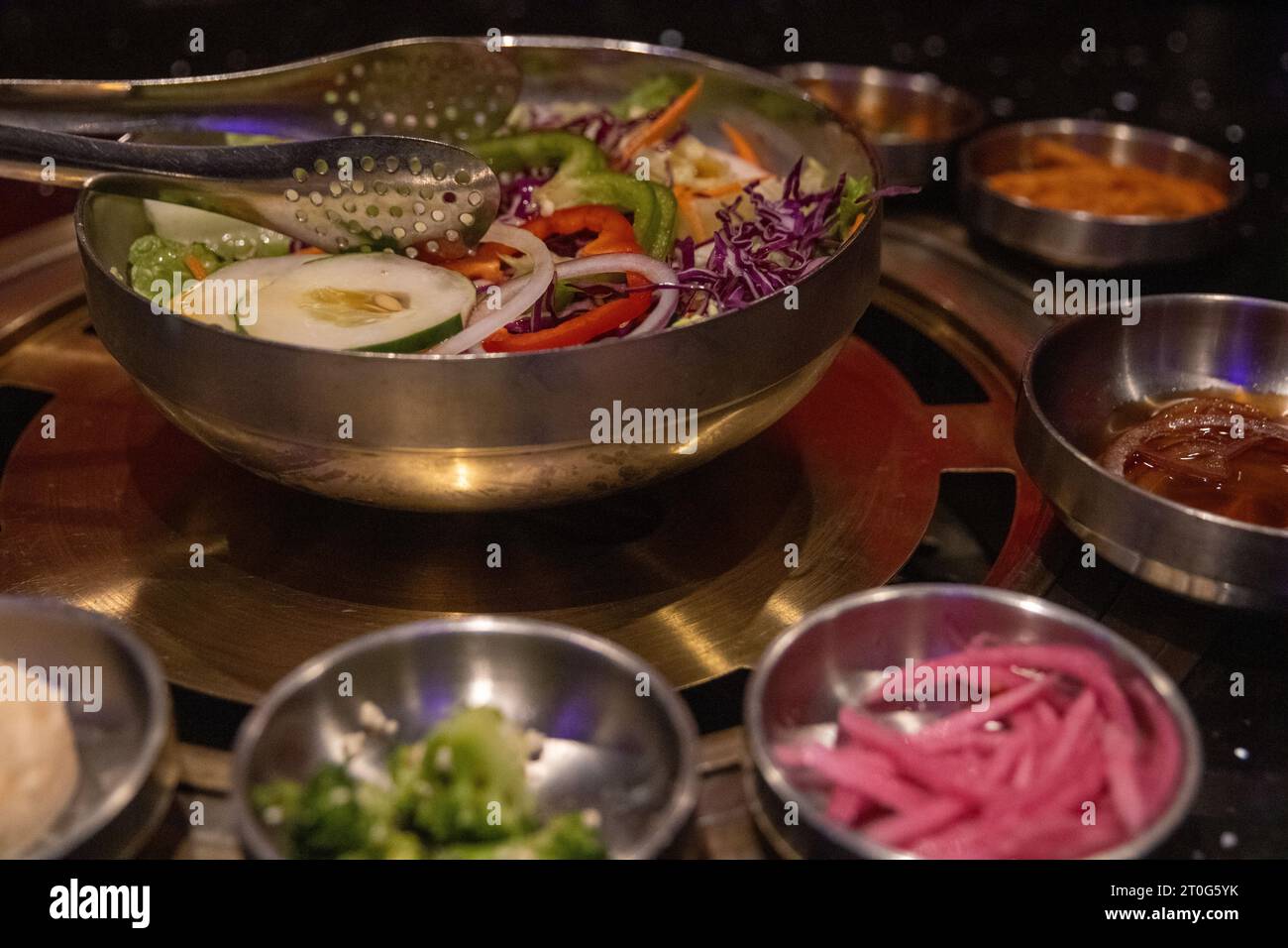 Salad and condiments at a Korean BBQ Stock Photo - Alamy