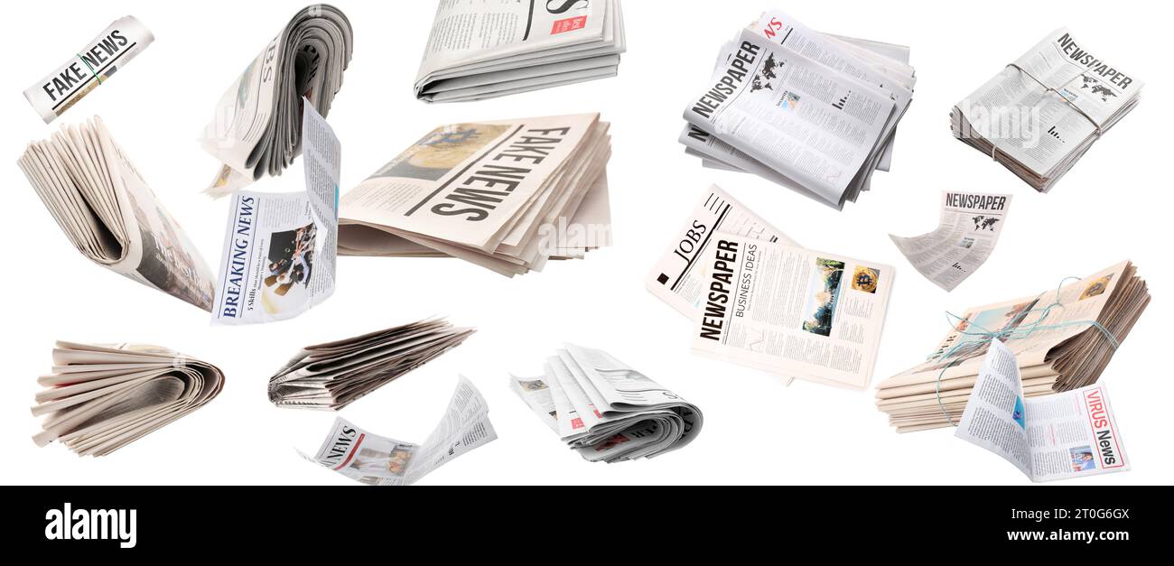 Many flying newspapers on white background Stock Photo - Alamy