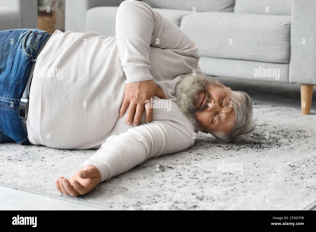 Elderly man lying unconscious on hi-res stock photography and images ...