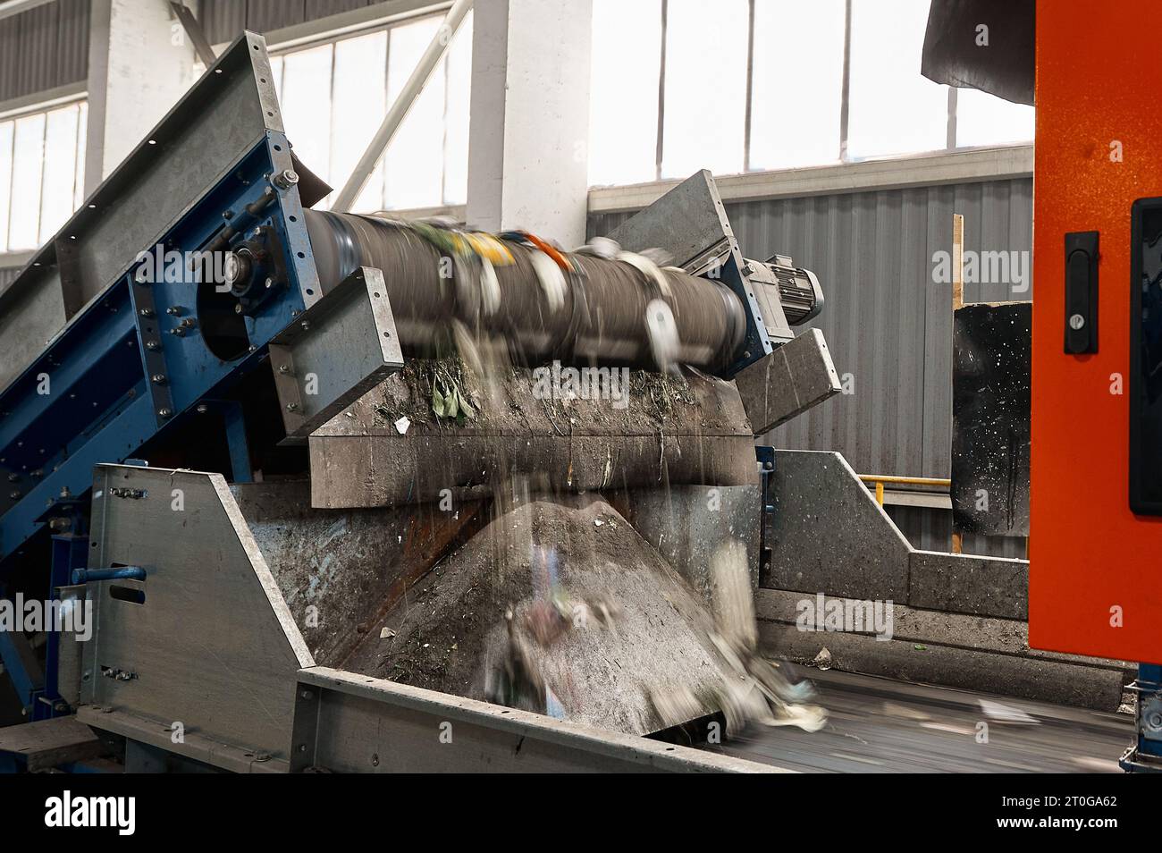 Wide conveyor with moving household waste. Waste sorting plant Stock ...