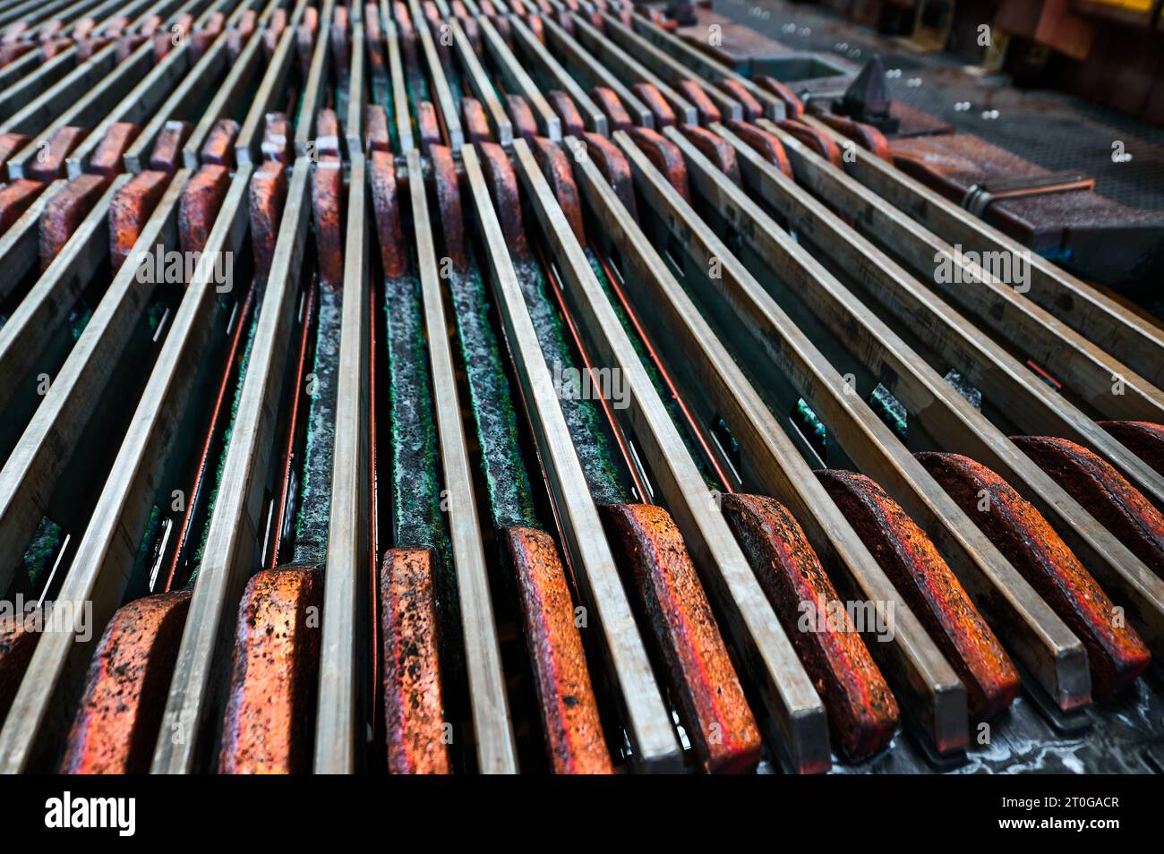 Electrolysis bathtub with installed copper anodes at plant Stock Photo ...
