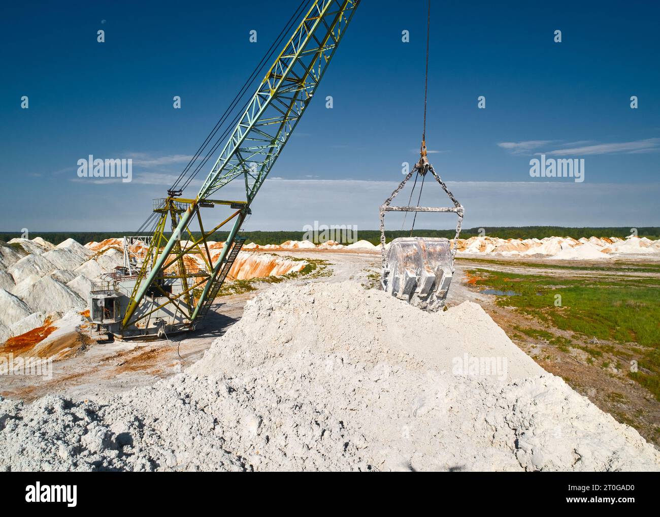 Walking dragline with limestone in bucket at chalkquarry Stock Photo ...