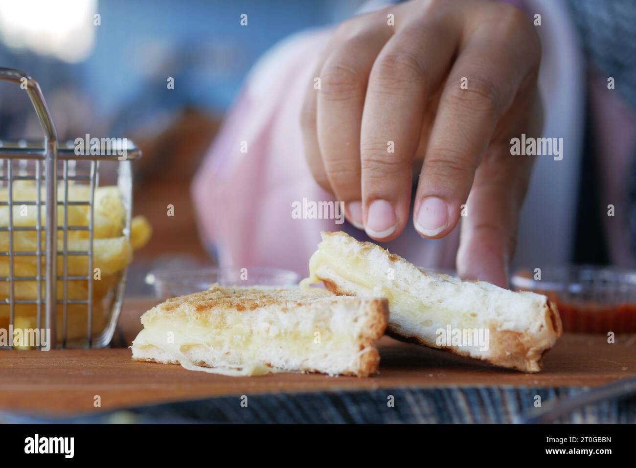 women hand pick Sandwich with ham, cheese, tomatoes Stock Photo - Alamy