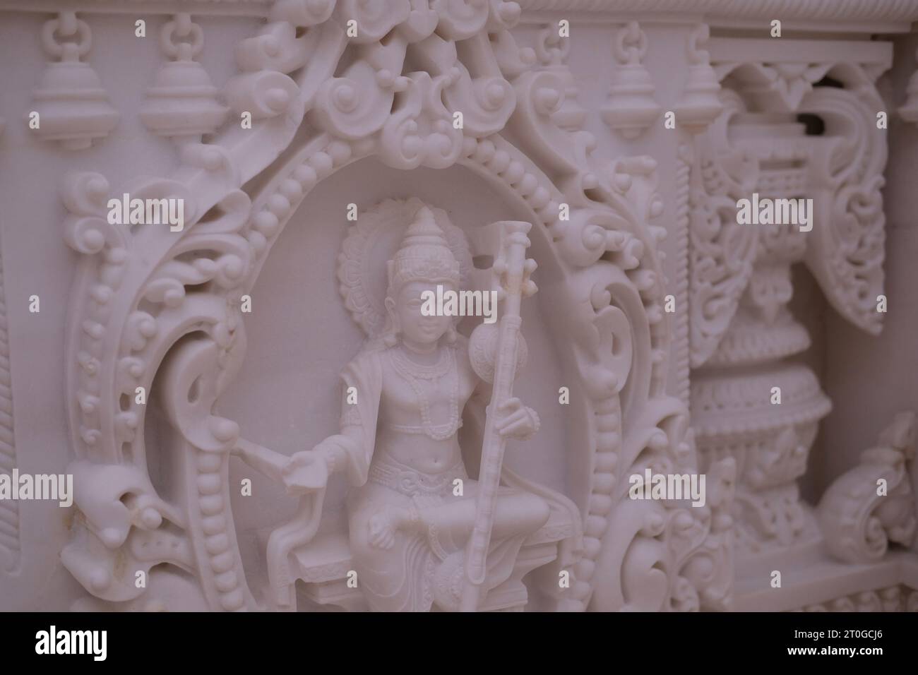 A hand-carved image of Saraswati, goddess of learning and wisdom ...