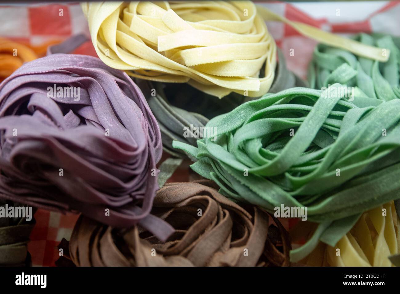 4 types of different infused pasta nests Stock Photo - Alamy