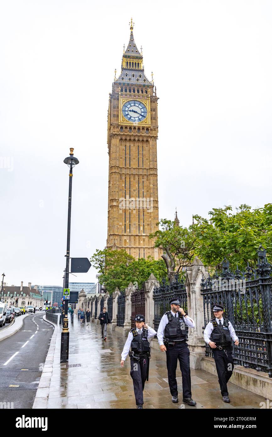 London police officers on Bridge street Westminster with Big Ben in the ...
