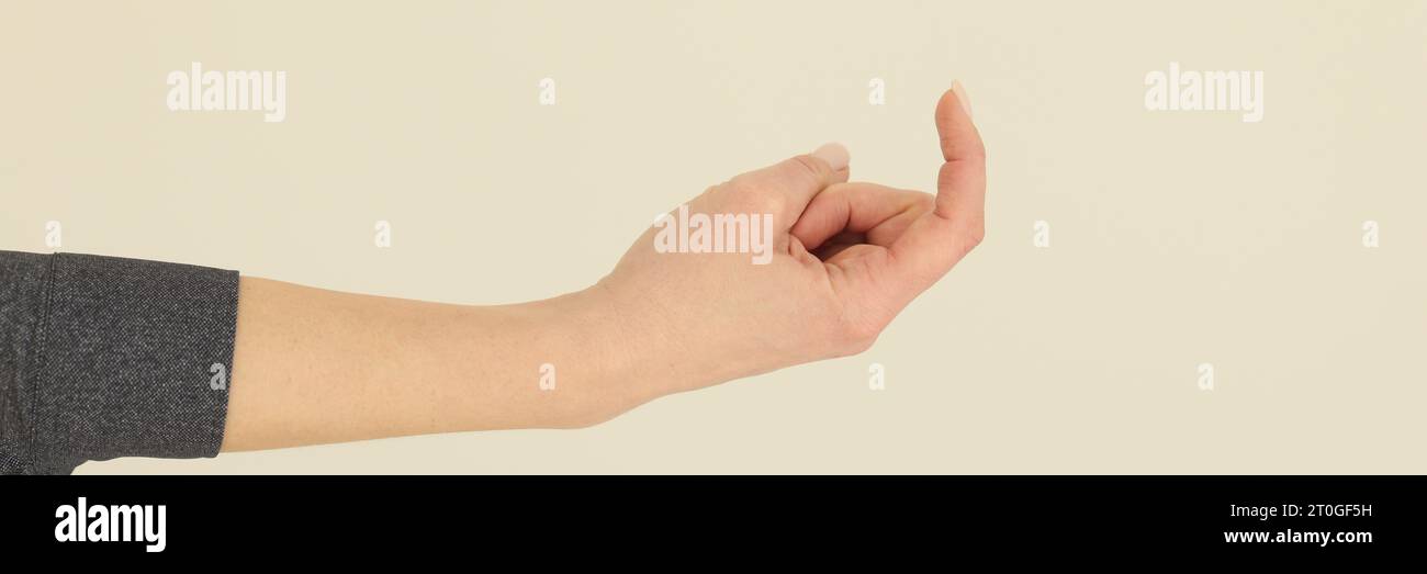 Beckoning hand sign hi-res stock photography and images - Alamy