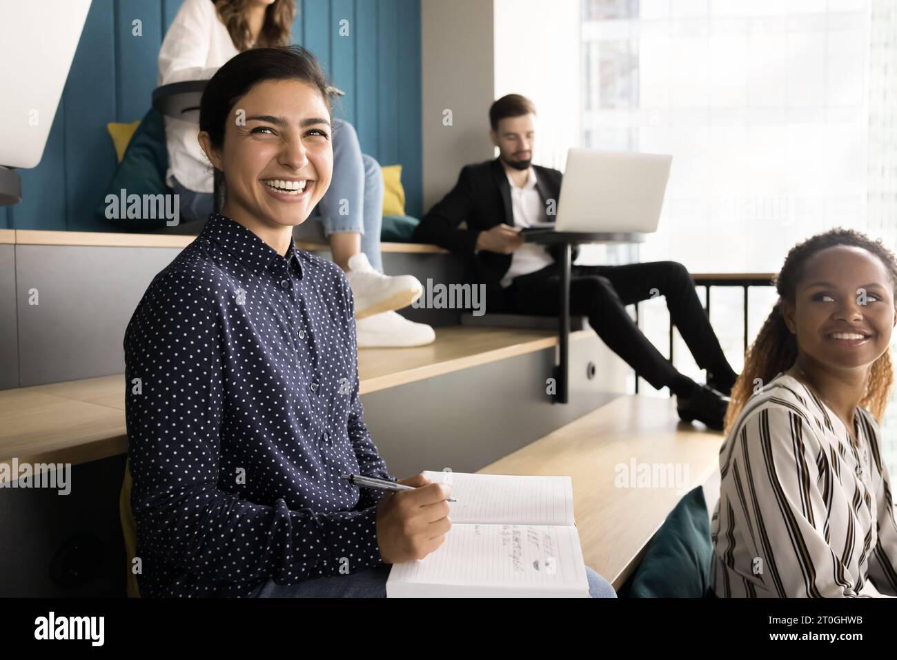 Happy Indian student woman attending educational business training ...