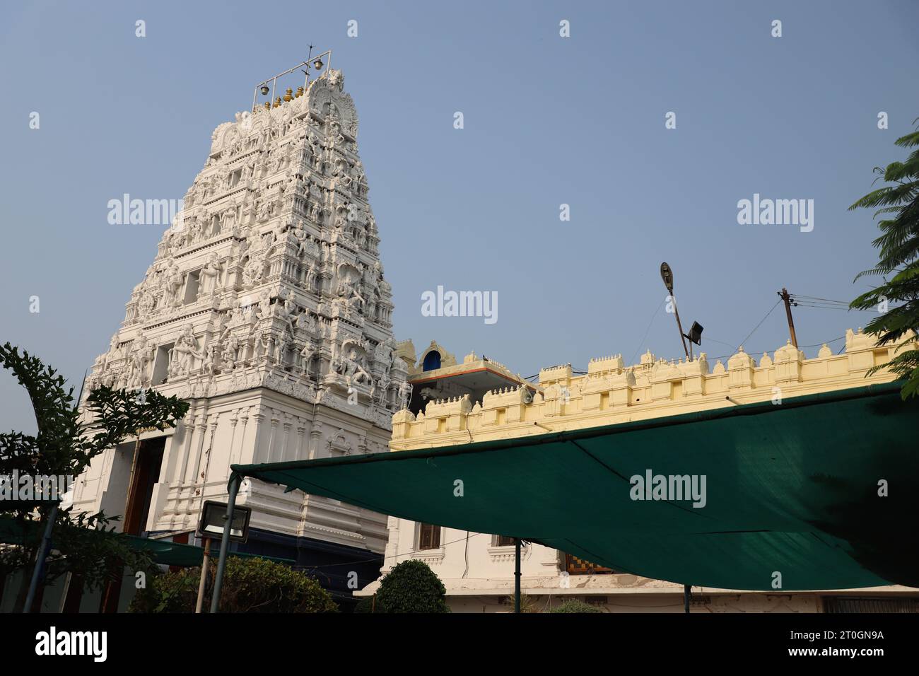 White Temple Tower of a Hindu God Stock Photo - Alamy