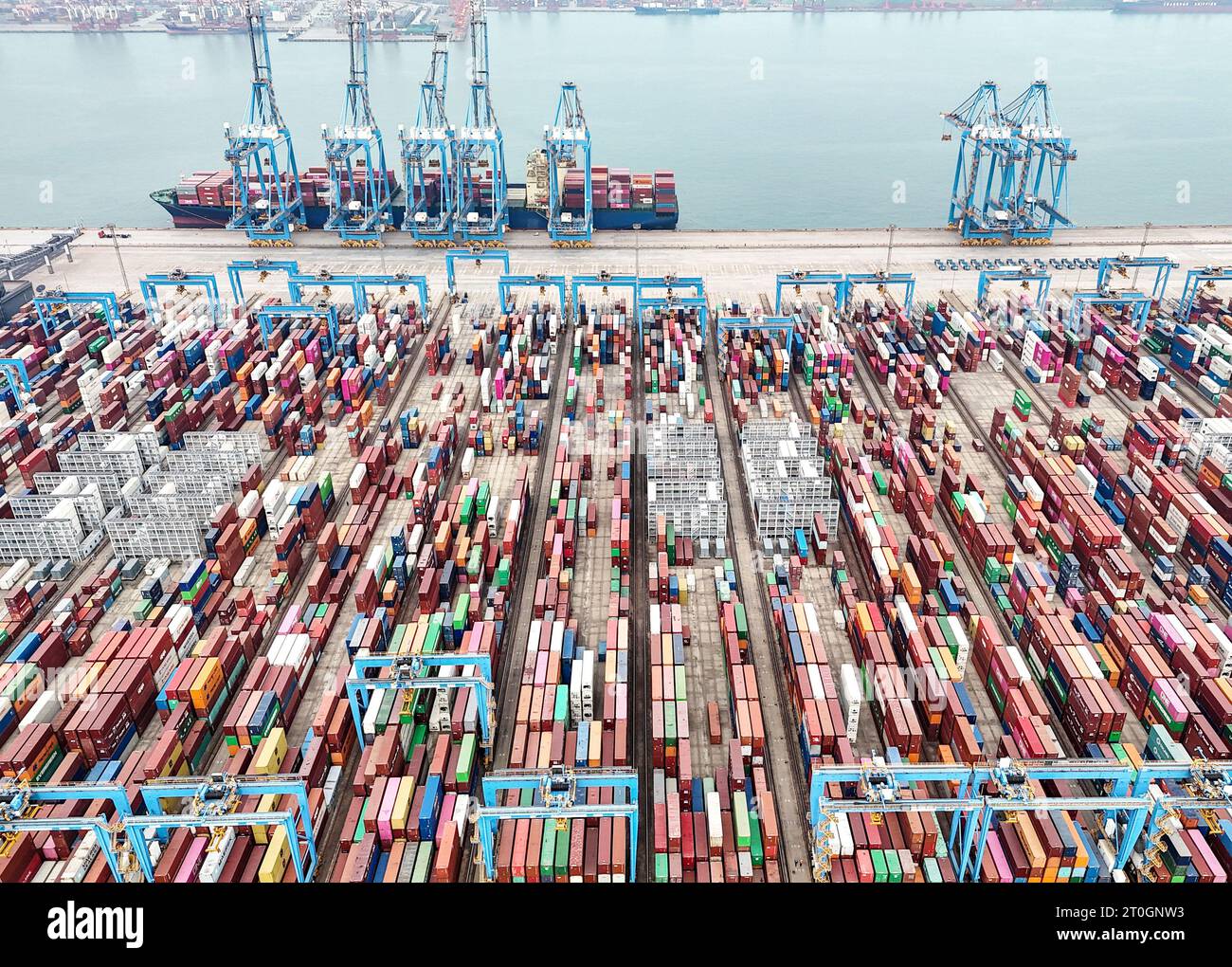 QINGDAO, CHINA - OCTOBER 7, 2023 - Several freighters dock at the fully automated terminal of ...