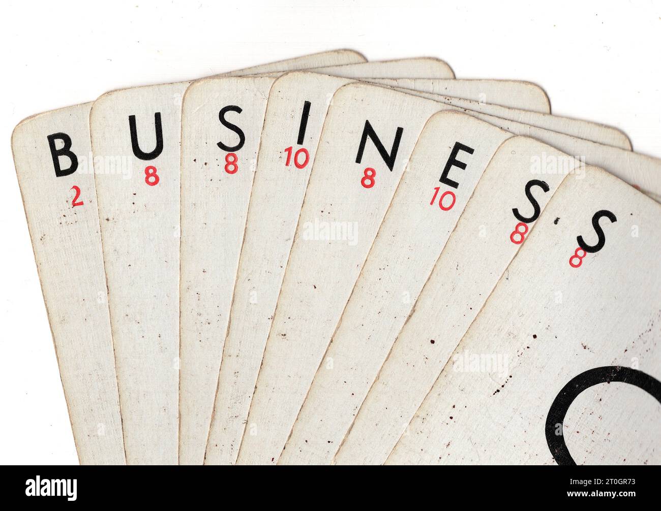 Vintage Lexicon playing cards spelling the word BUSINESS on a white ...