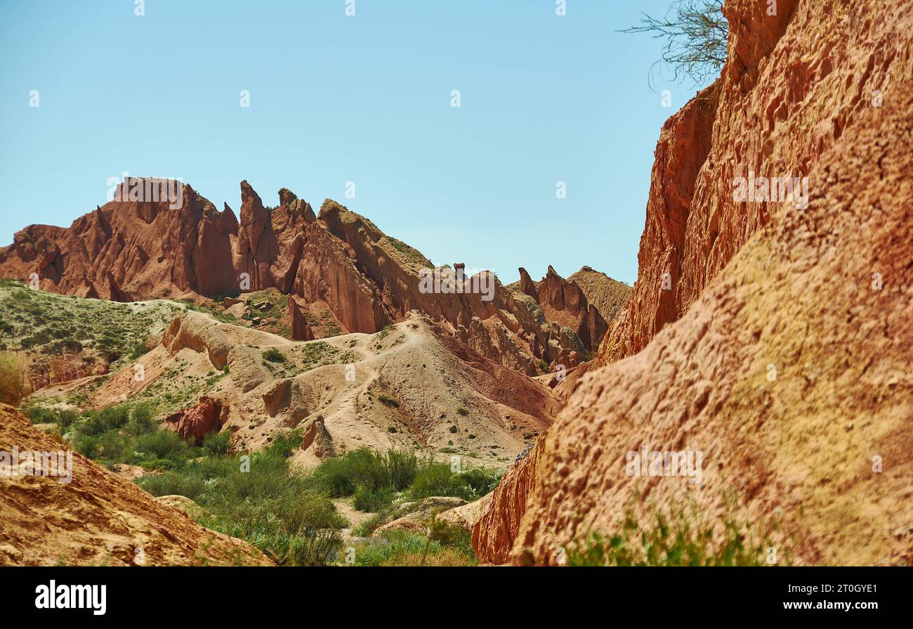 Fairy Tale Canyon, rock formations on the Issyk-Kul lake. Kyrgyzstan ...