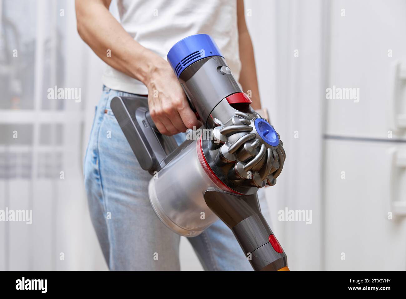 Worker uses vacuum clean hi-res stock photography and images - Alamy