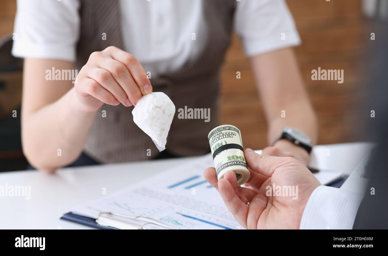 Exchanging a handshake hi-res stock photography and images - Alamy