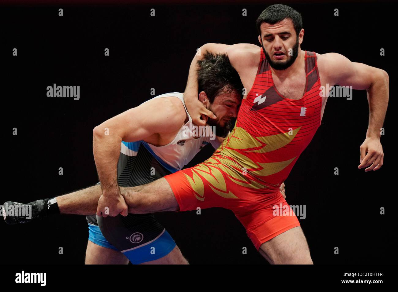 Bahrain's Magomed Sharipov, right, and Uzbekistan's Javrail Shapiev ...